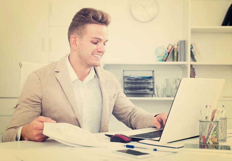 Man Working with Documents and Laptop Stock Image - Image of caucasian ...
