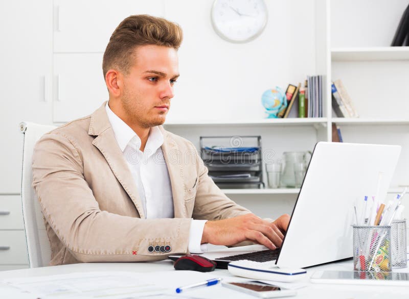 Man Working with Documents and Laptop Stock Image - Image of office ...