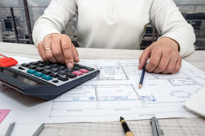 A Man Working on a Drawing To Create His Home with Professional Design ...