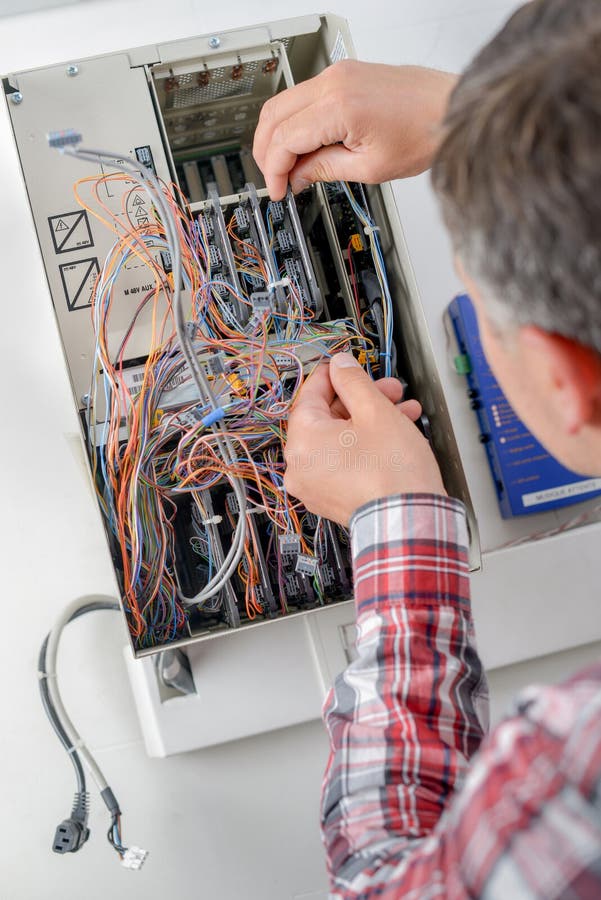 Man Working on Electric Box Stock Image - Image of energy, middleaged ...
