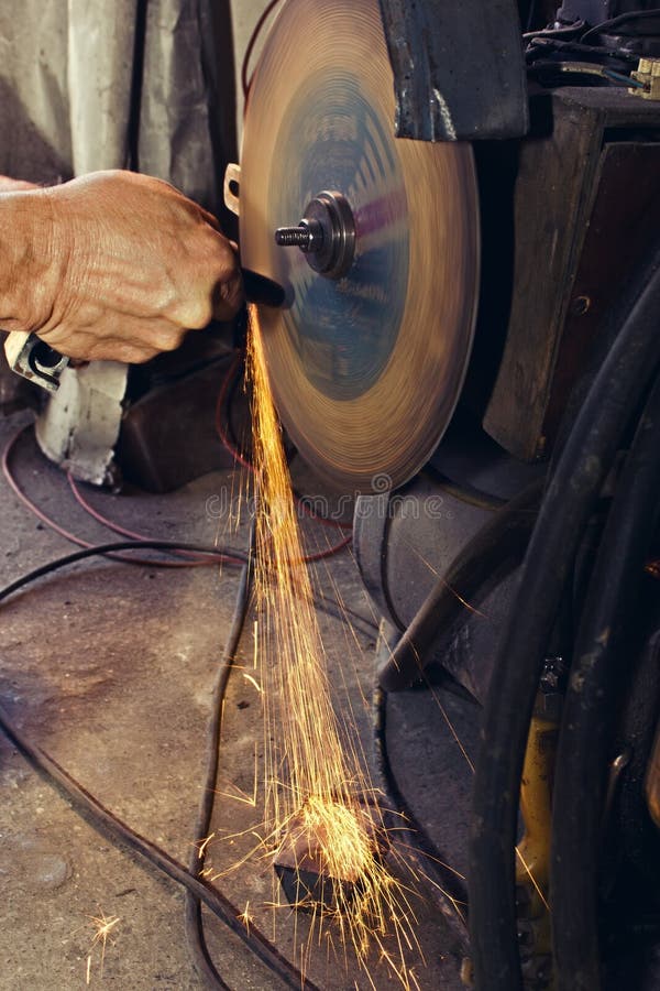 Man Working with Electric Grinder Tool Stock Image - Image of machine ...