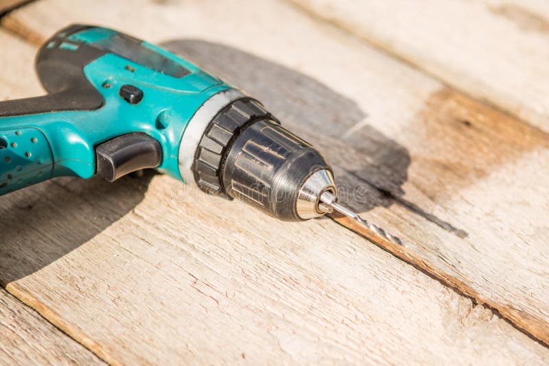 Man Working with an Electric Screwdriver Stock Photo - Image of holding ...