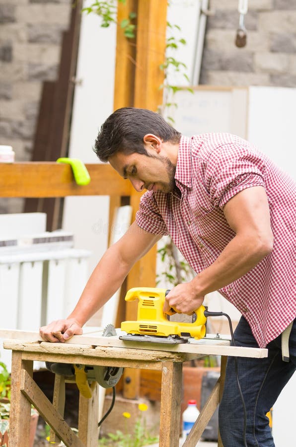 Man Working with an Electrical Sander Stock Image - Image of powertool ...