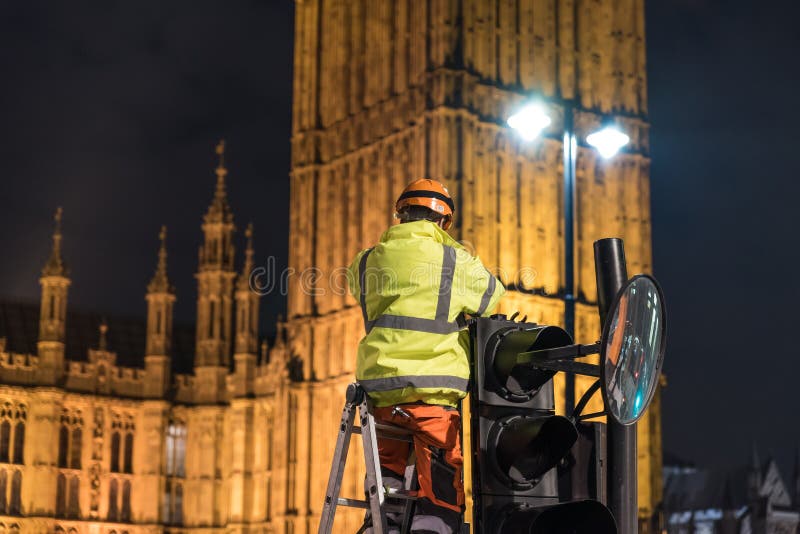 Man working stock image. Image of england, work, traffic - 79821067