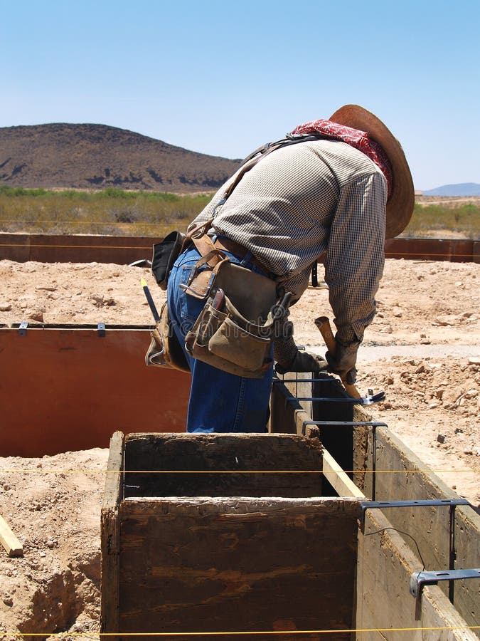 Man Working on Excavation Site - Vertical Stock Image - Image of ...