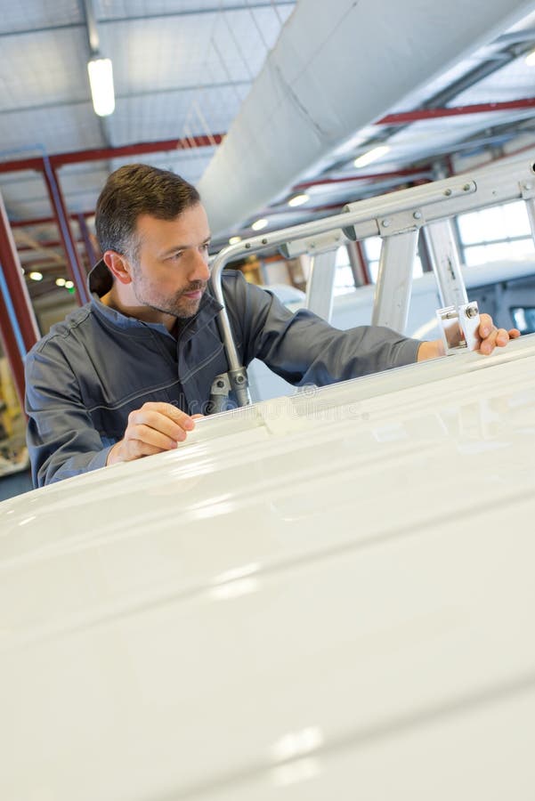 Man working in factory stock image. Image of plastics - 99254691