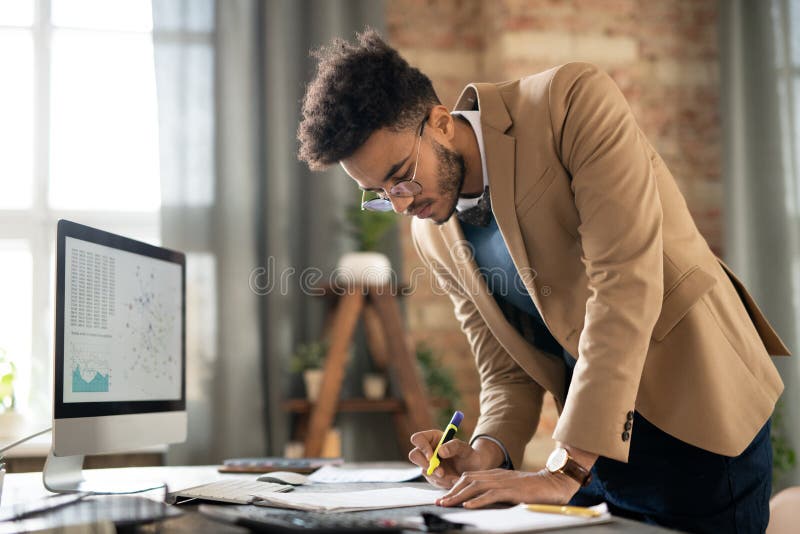 Working with graphs stock photo. Image of associate, document - 21562156