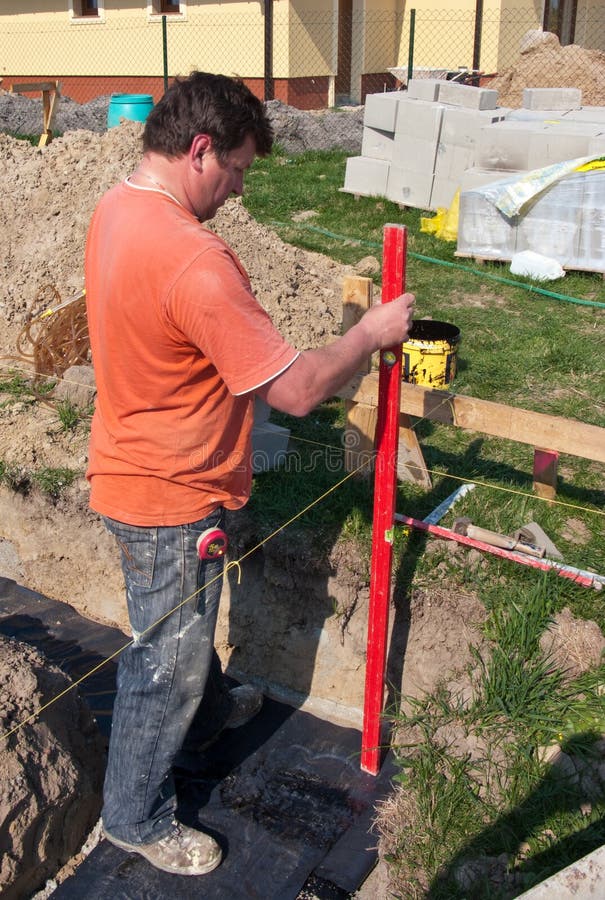 Man working on foundation stock photo. Image of builder - 19316692
