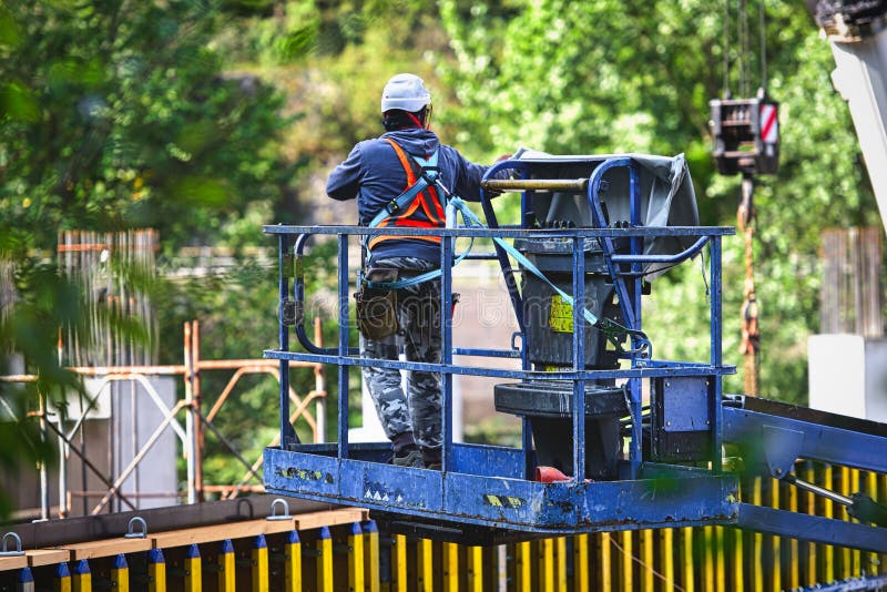 Man Working on Freight Elevators on a Construction Site Stock Photo ...
