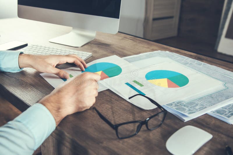 Man Working in Graph in Office Stock Image - Image of businessman ...