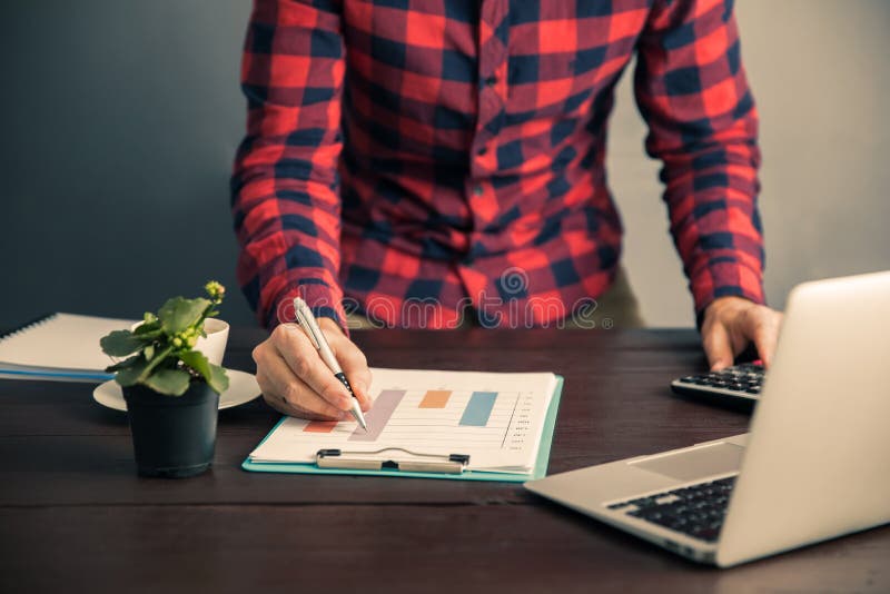 Man Working in Graph in Working Table Stock Image - Image of person ...