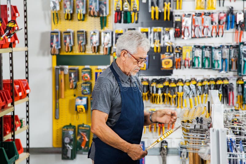 Hardware shop storekeeper stock photo. Image of professional - 41255568