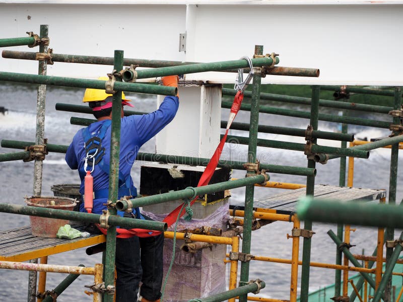 Man Working on the Working at Height on Construction Stock Photo ...