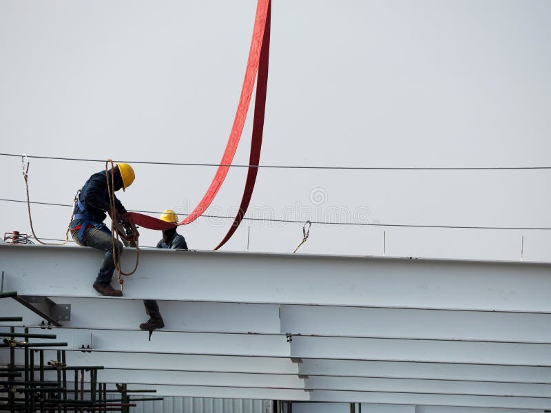 Man Working on the Working at Height on Construction Stock Photo ...