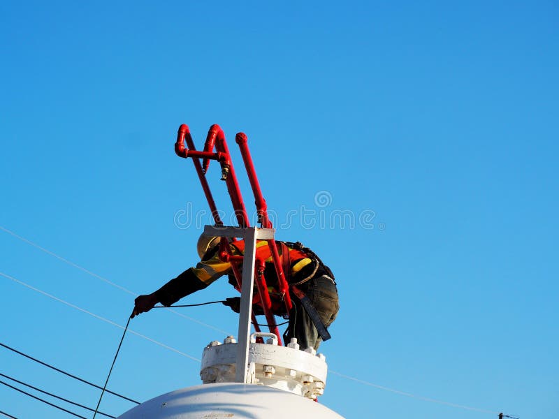 Man Working on the Working at Height Editorial Stock Photo - Image of ...