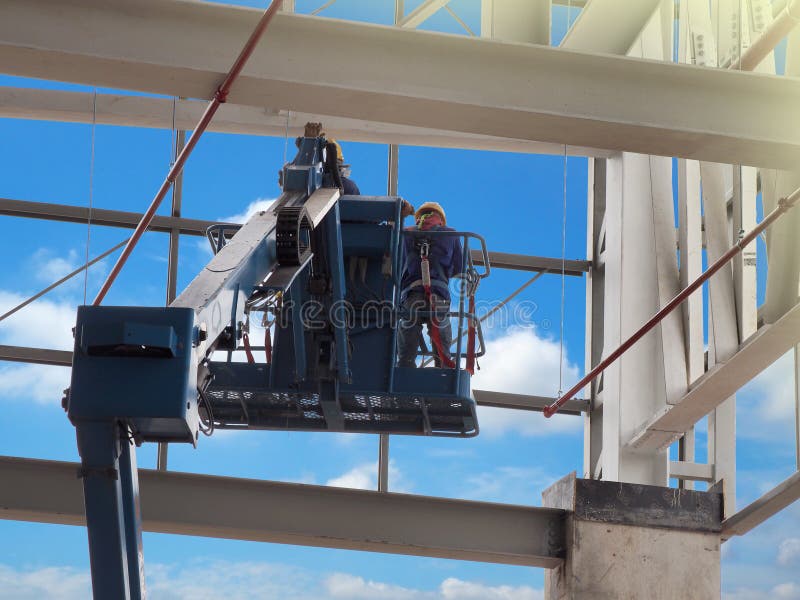 Man Working on the Working at Height on Construction Stock Photo ...