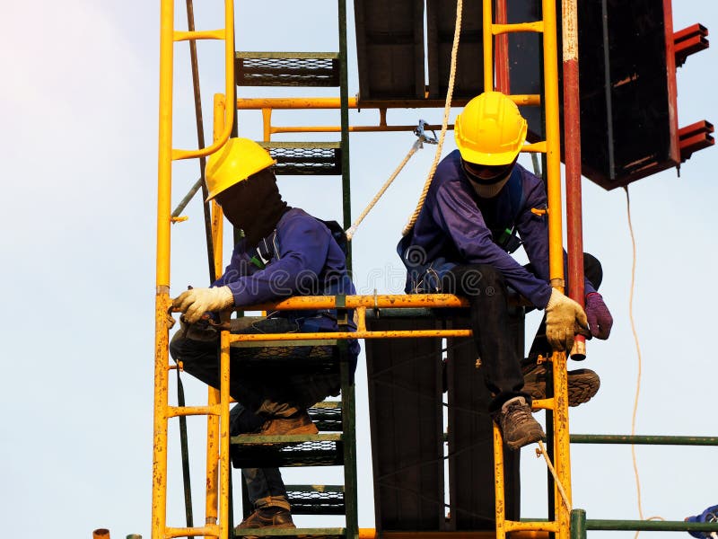 Man Working on the Working at Height on Construction Stock Photo ...