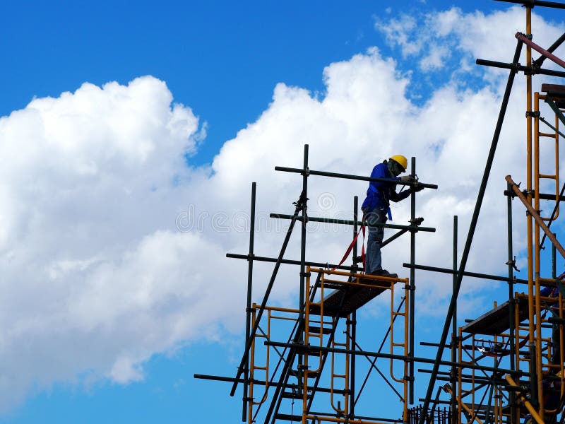 Man Working on the Working at Height on Construction Stock Photo ...