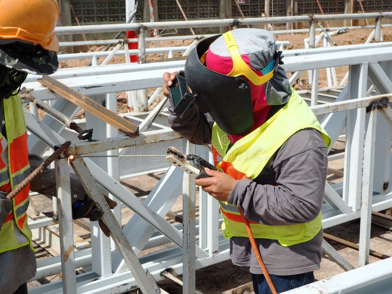 Welder working at height stock image. Image of laborer - 33157867