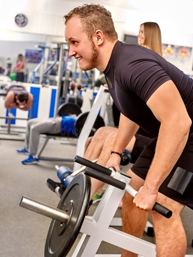 Man Working His Arms and Back at Gym Stock Photo - Image of heavy ...
