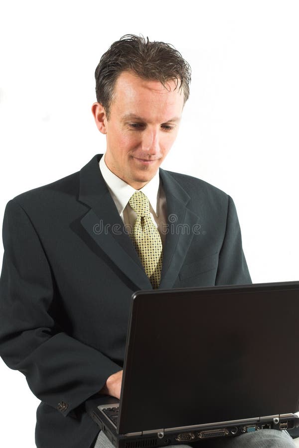 Man working on his laptop stock photo. Image of working - 593846