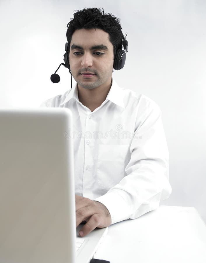 Man working on his laptop stock image. Image of hearing - 7319609