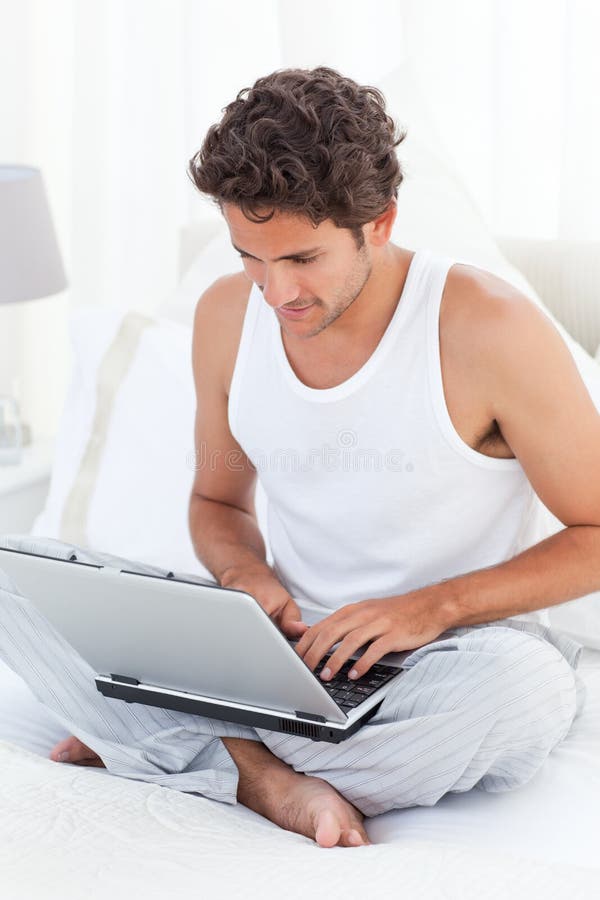 Man Working on His Laptop at Home Stock Photo - Image of cheerful ...