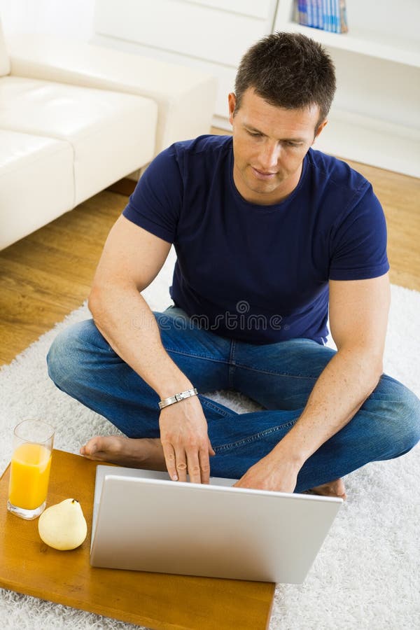 Man working at home stock photo. Image of adult, internet - 8971808