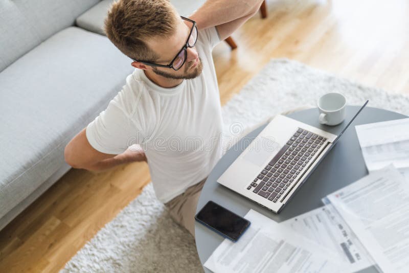 Man Working from Home during the Coronavirus Pandemic Stock Photo ...