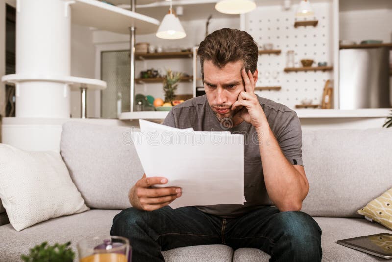 Man Working from Home Doing Paperwork Stock Photo - Image of domestic ...