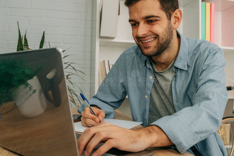 Man working at home stock photo. Image of communication - 242736446
