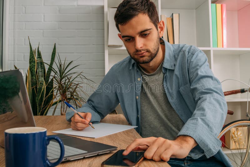 Man working at home stock photo. Image of freelancer - 242736480