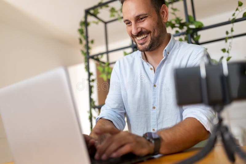 Man Working Remotely from Home Teaching an Online Class Stock Image ...