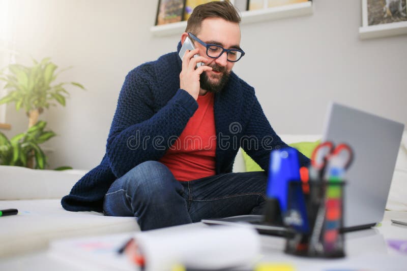 Man working at home stock image. Image of office, bespectacled - 69154911