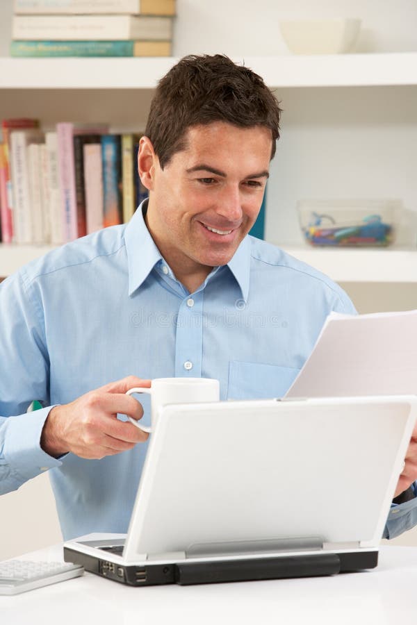 Man Working from Home Using Laptop Stock Image - Image of happy, coffee ...