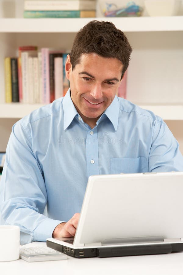 Man Working from Home Using Laptop Stock Image - Image of home, happy ...