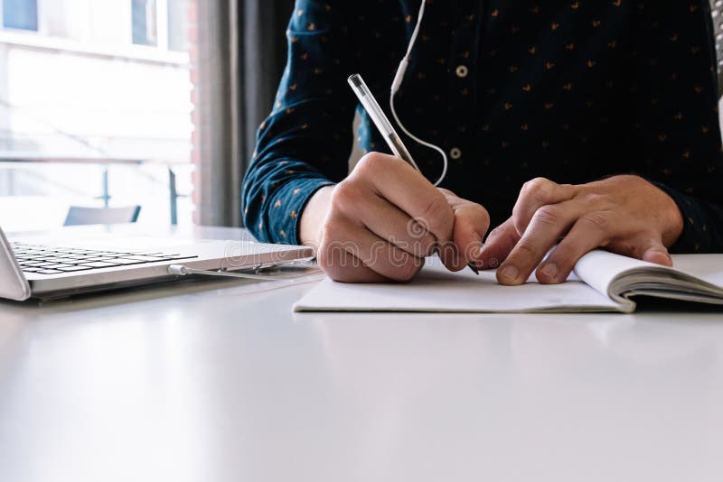 Man Working at Home and Writing Down His Plan of Action Stock Image ...