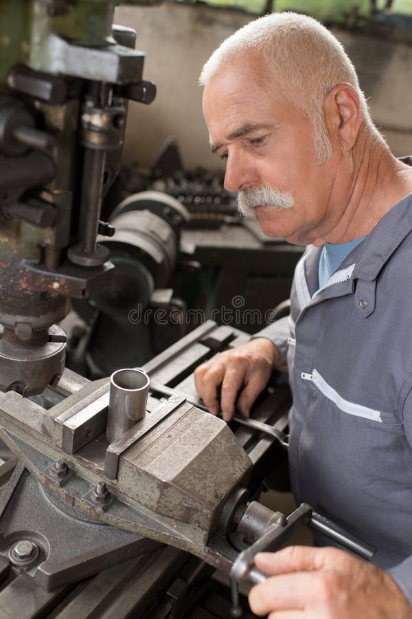 Man Working with Instruments Stock Photo - Image of milling, instrument ...