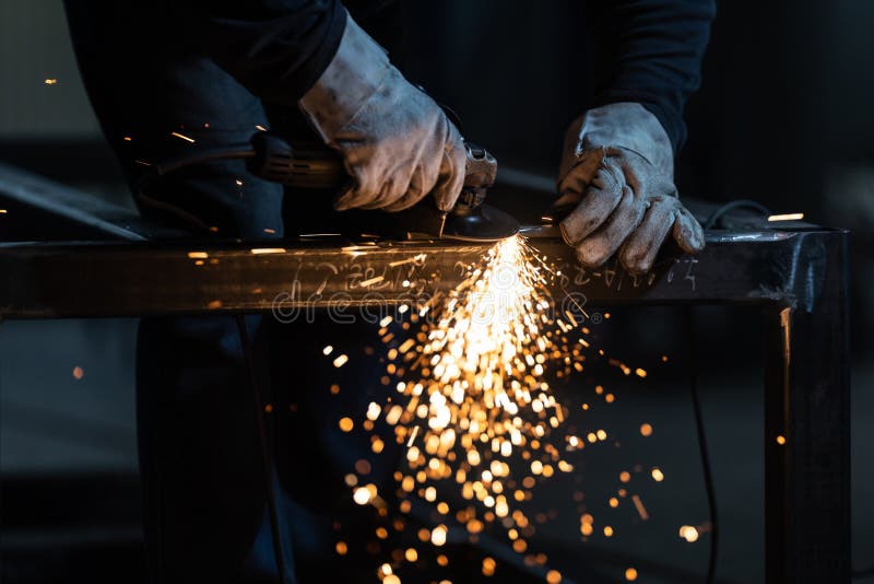 Man Working on Iron with Grinder Stock Image - Image of machine ...