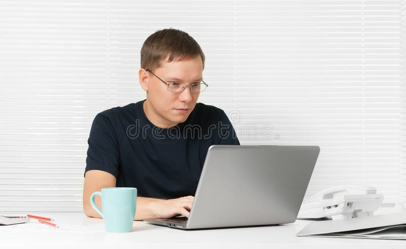 Young Man Typing on Laptop in Pajamas Stock Photo - Image of internet ...
