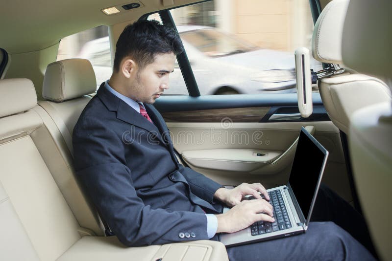 Man Working with Laptop in the Car Stock Image - Image of people ...