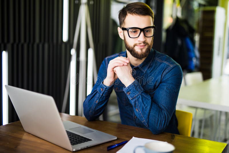 Man Working at Laptop in Contemporary Office. Look on Side Stock Image ...