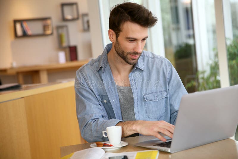 Man Working on Laptop Drinking Coffee Stock Image - Image of happy ...