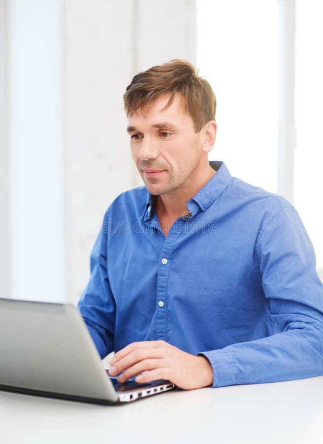 Man Working with Laptop at Home Stock Image - Image of looking ...