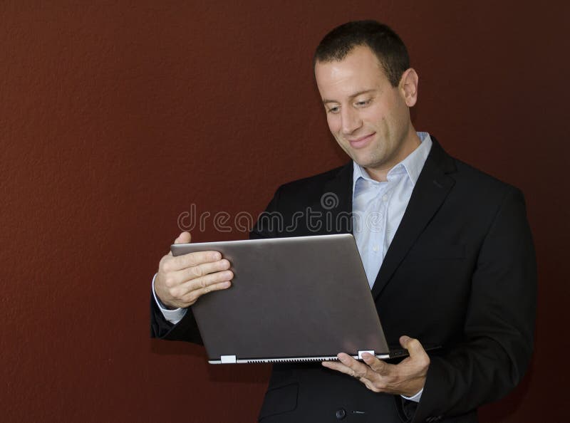 Man working with a laptop. stock photo. Image of professional - 76766124