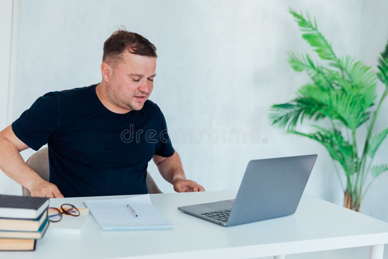 Man Working on Laptop in Office Cabinet Stock Image - Image of computer ...