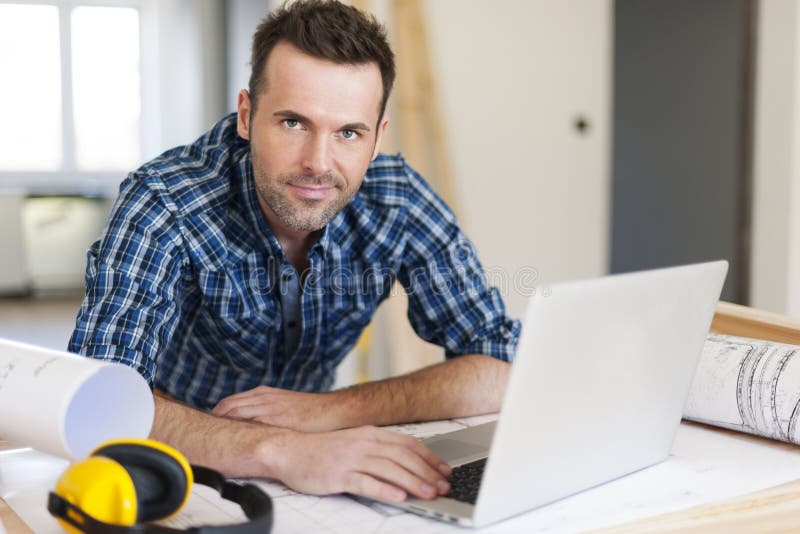 Man working on laptop stock image. Image of lumberjack - 39367759