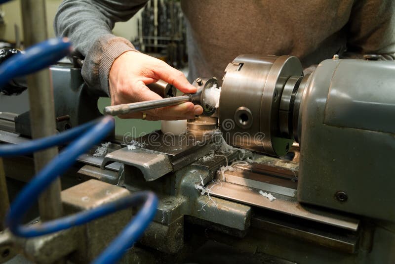 Man working on a lathe stock image. Image of equipment - 25917357