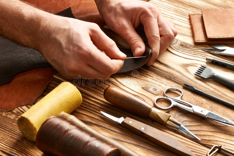 Man working with leather stock image. Image of shoemaker - 67206319