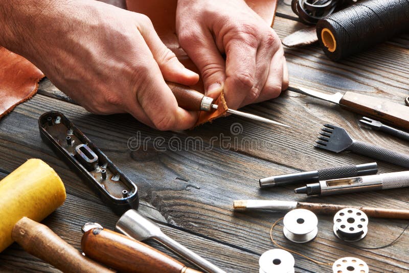 Man working with leather stock photo. Image of repair - 67613222